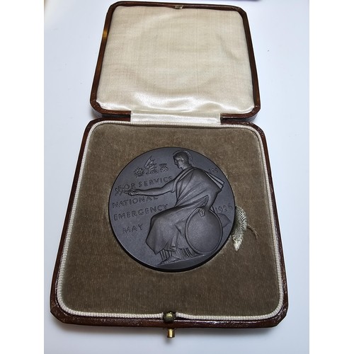 A rare bronze medallion awarded for service in the general strike of ...