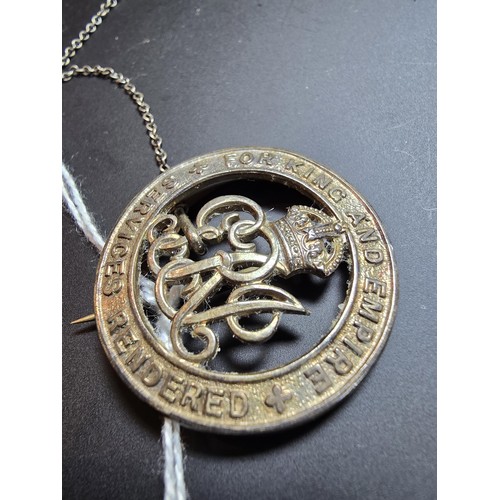 A rare WW1 silver war badge for services rendered. Numbered to the back ...