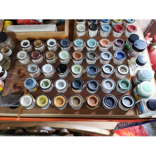 Large quantity of model makers paints in sectional trays along with ...