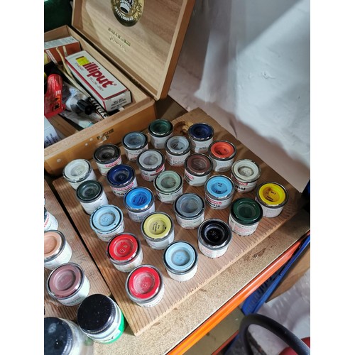 Large quantity of model makers paints in sectional trays along with ...