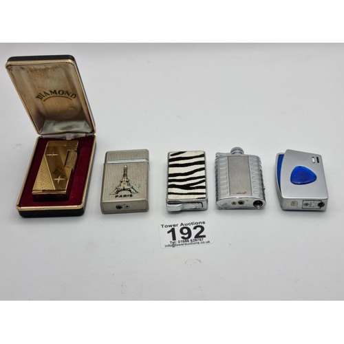 Collection of 5 lighters inc cased Diamond lighter, a suede zebra lined ...