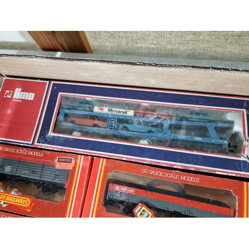 Box containing a quantity of Hornby 00 rolling stock, inc Impressive ...