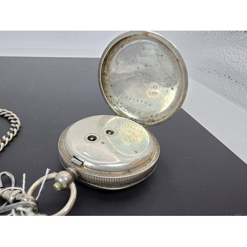 A hallmarked Silver antique Pocket Watch with a hallmarked Silver ...