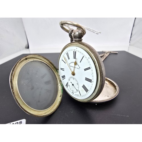 A hallmarked Silver antique Pocket Watch with a hallmarked Silver ...