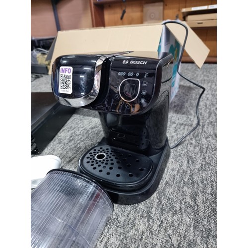 Good quality Bosch Tassimo coffee machine along with a Tassimo storage ...