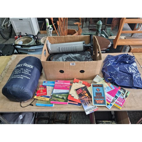 A box full of camping gear to include a sleeping bag by Scafell Rock ...