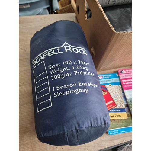 A box full of camping gear to include a sleeping bag by Scafell Rock ...