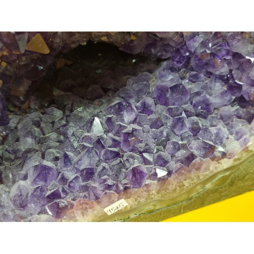 A Large good quality amethyst geode. The geode is in good order and the ...