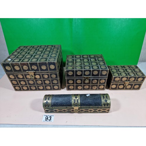A good quality wooden graduated box set with brass decoration in the ...
