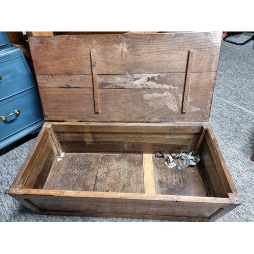 An antique 18th Century solid elm coffer chest having a tapered coffin ...