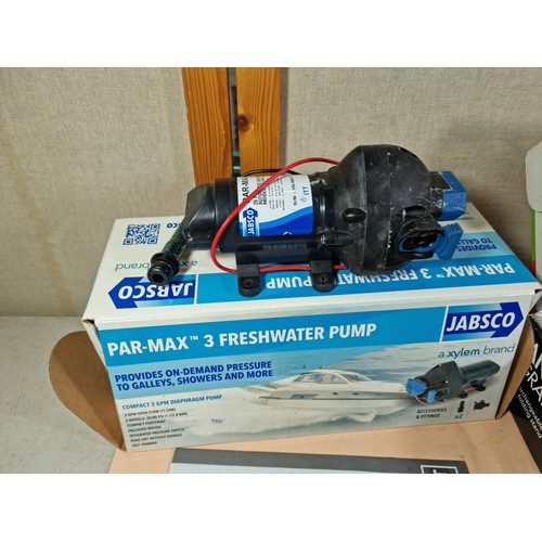 A boxed Par Max 3 fresh water pump by Jabsco along with a boxed grater ...