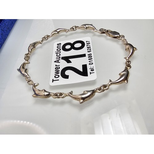A 925 silver bracelet featuring a chain of dolphins. The bracelets in ...