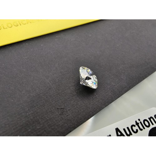 A stunning rare 4ct round cut brilliant clear moissanite diamond with a ...