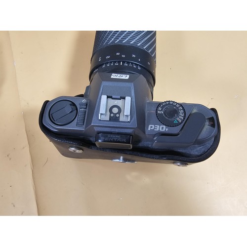 Pentax P30 35mm camera with a Sigma zoom APO lens along with Pentax 35 ...