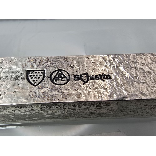 A solid Cornish tin ingot paperweight by St Justin produced as a ...