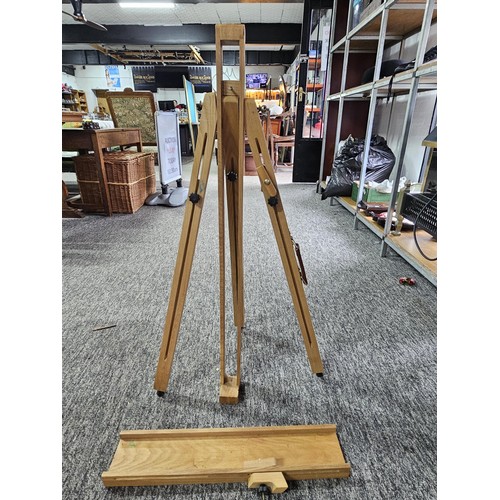 A good quality wooden easel with carry handle, fully adjustable and ...