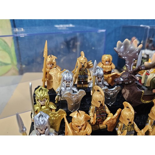 A collection of Mirkwood Elves figures in 4 perspex boxes covering ...