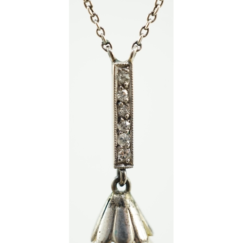 A 1920's platinum, single stone pear shaped cultured pearl and six ...