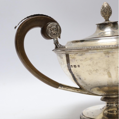 A 1930's silver circular pedestal three piece tea set, Goldsmiths ...