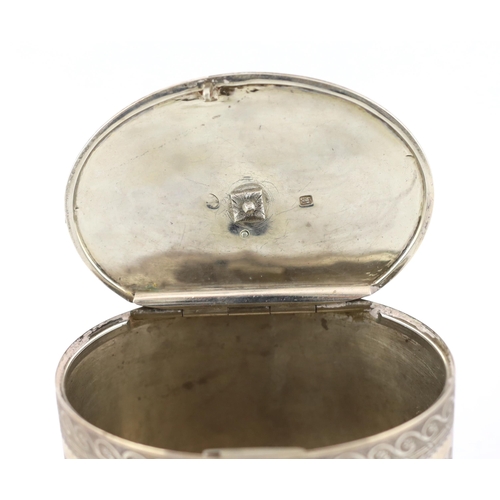 A George III engraved silver ova tea caddy, by Thomas Daniell ...