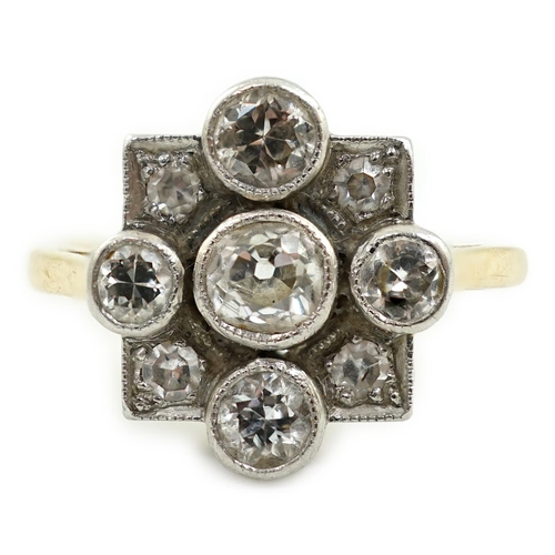 A 1920's/1930's 18ct gold, platinum and millegrain set nine stone ...
