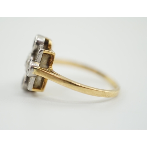 A 1920's/1930's 18ct gold, platinum and millegrain set nine stone ...