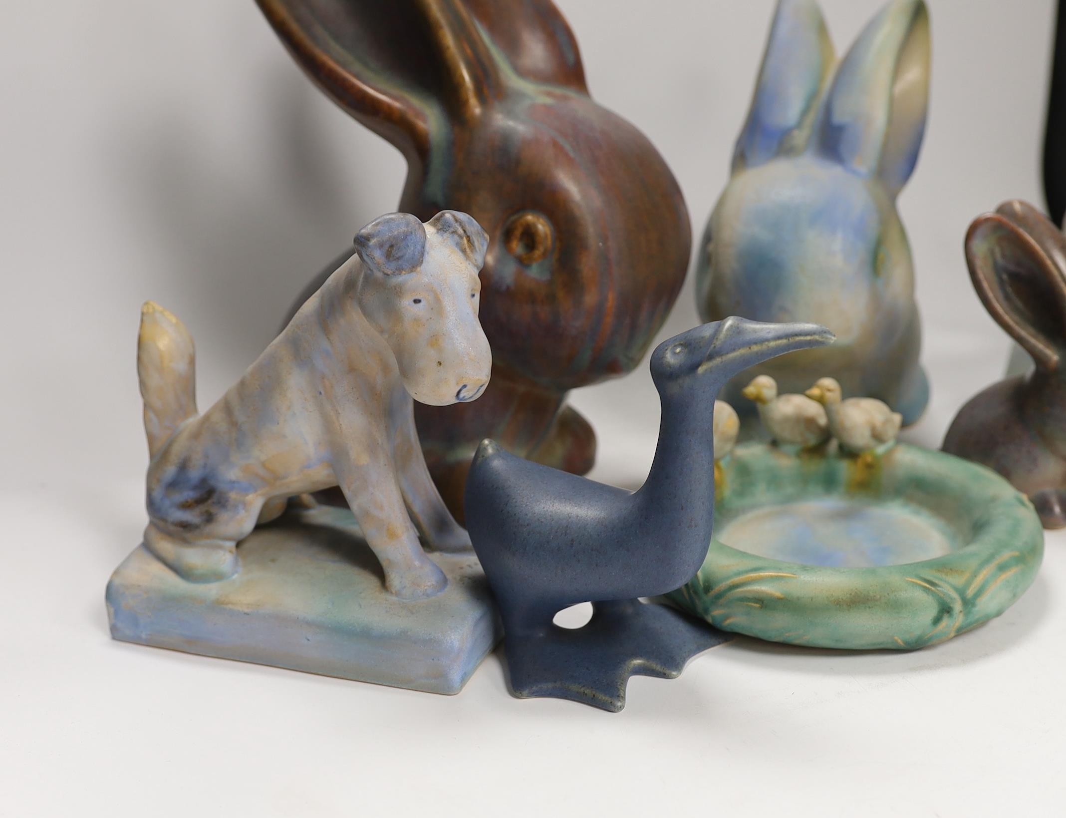 Collection of Bourne Denby animals including rabbits and a pair of dogs ...