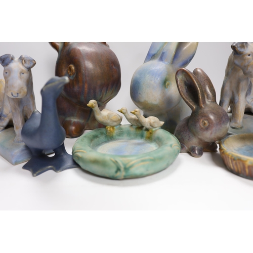 Collection of Bourne Denby animals including rabbits and a pair of dogs ...