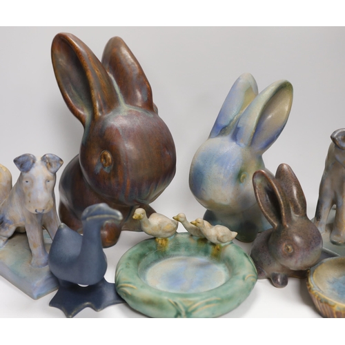 Collection of Bourne Denby animals including rabbits and a pair of dogs ...