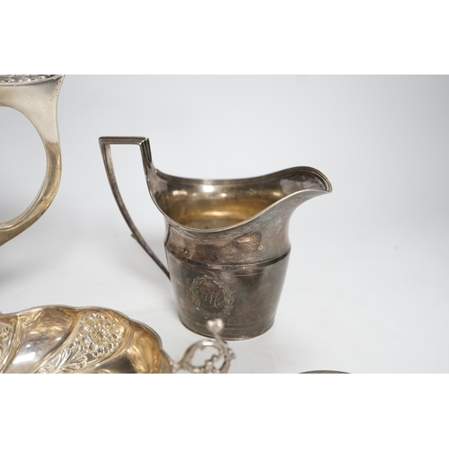 A George III engraved silver helmet shaped cream jug, John Eames ...