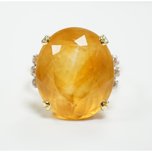 An 18k and single stone oval cut citrine set dress ring, with six stone ...