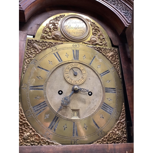 A George II walnut and feather banded longcase clock, Christopher ...