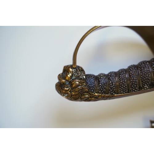 An early 19th century Royal Navy officer's sword with engraved blade ...