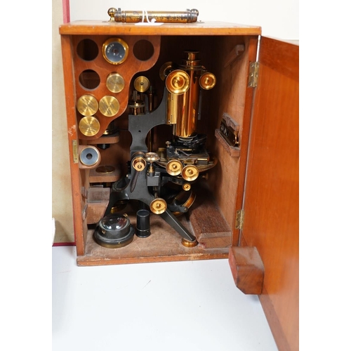 A late 19th/early 20th century brass microscope, by Watson and Sons, in ...