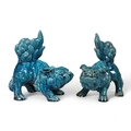 A pair of Japanese shi-shi dog figures, blue glaze finish. 19cm ...