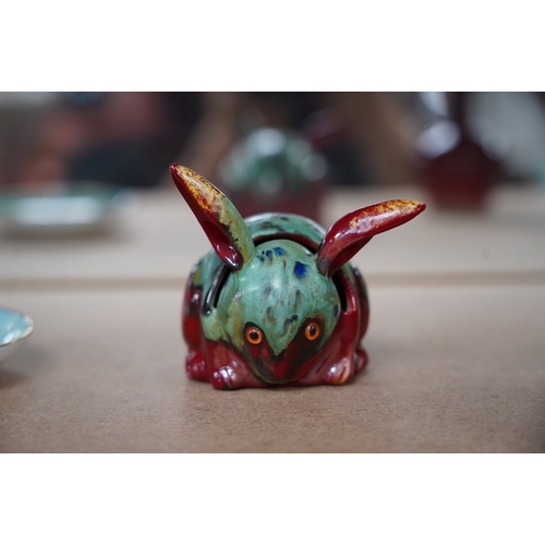 A Bernard Moore rabbit menu holder with inset orange glass eyes, c.1910 ...