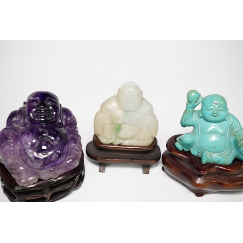 Three Chinese hardstone carvings of Budai, in jadeite, turquoise matrix ...