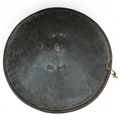 A 19th century Ethiopian/Somali leather shield, 56cm diameter, outside ...