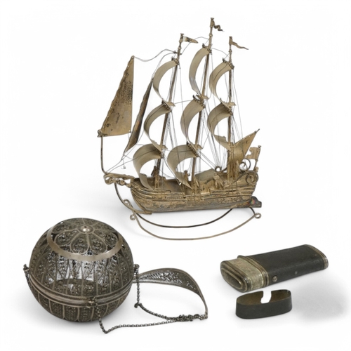 A Dutch? miniature white metal model of a three masted ship, on a ...