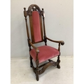 A Carolean style beech and walnut high back elbow chair, width 63cm ...