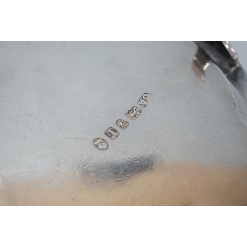 A George III silver cusped oval teapot stand, by Charles Aldridge ...