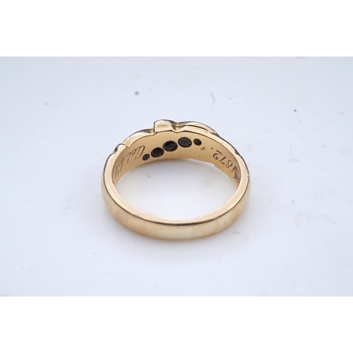 A Victorian enamel and diamond mourning ring, circa 1872, of foliate ...