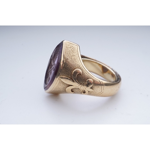 A gold and amethyst episcopal ring, early 20th century, set with a ...