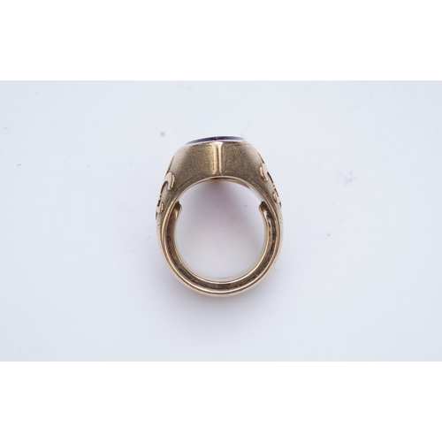A gold and amethyst episcopal ring, early 20th century, set with a ...