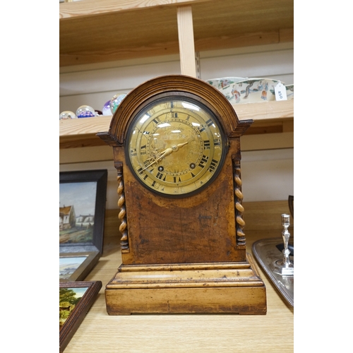 A 19th century French walnut bracket clock, the engraved brass dial ...