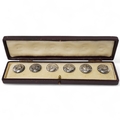 A cased set of six Edwardian small silver buttons, by Turner & Simpson ...
