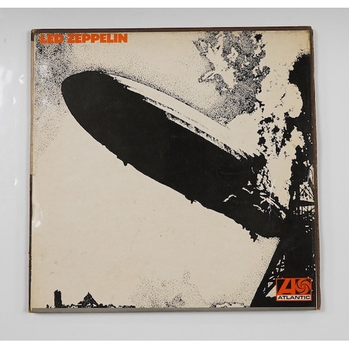 Led Zeppelin; the first three LP record albums, all on red and plum ...