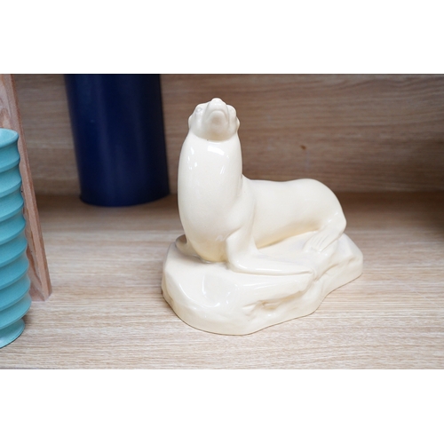 John Skeaping for Wedgwood, an Art Deco seal, straw glazed, 21cm wide