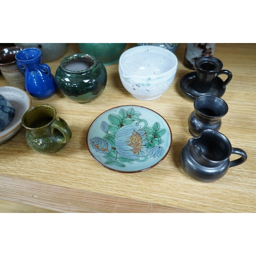 A collection of studio pottery to include a small Danish squat vase, a ...