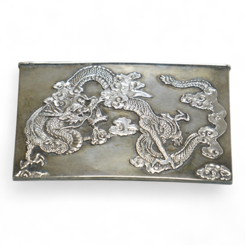 A Japanese Meiji period white metal card case, with applied dragon ...